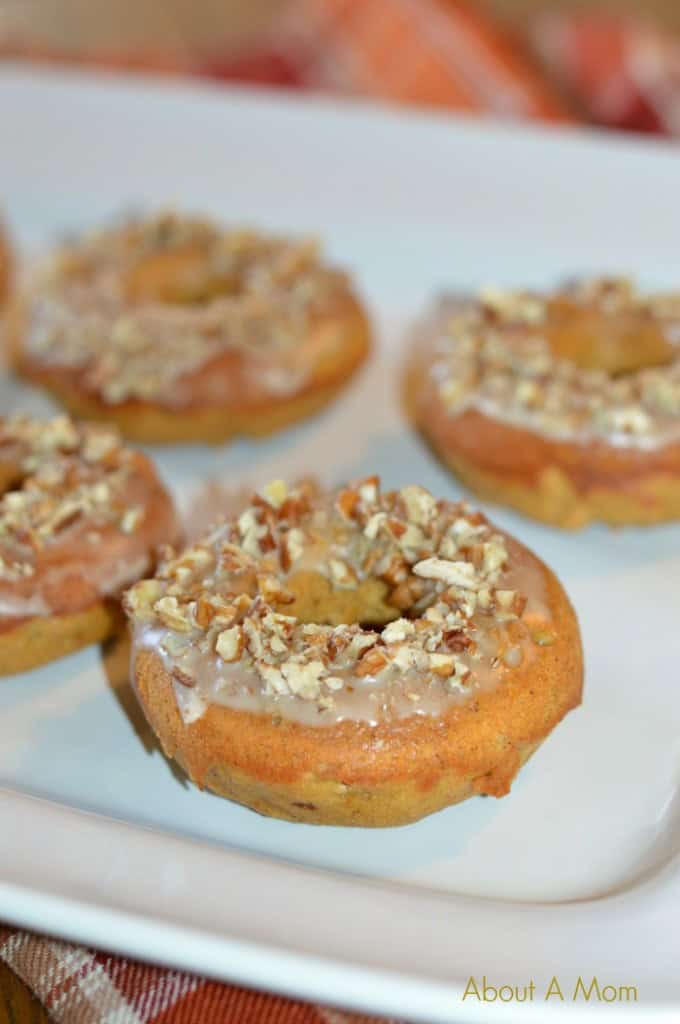 Baked Pumpkin Pecan Doughnuts with Maple Glaze - About a Mom